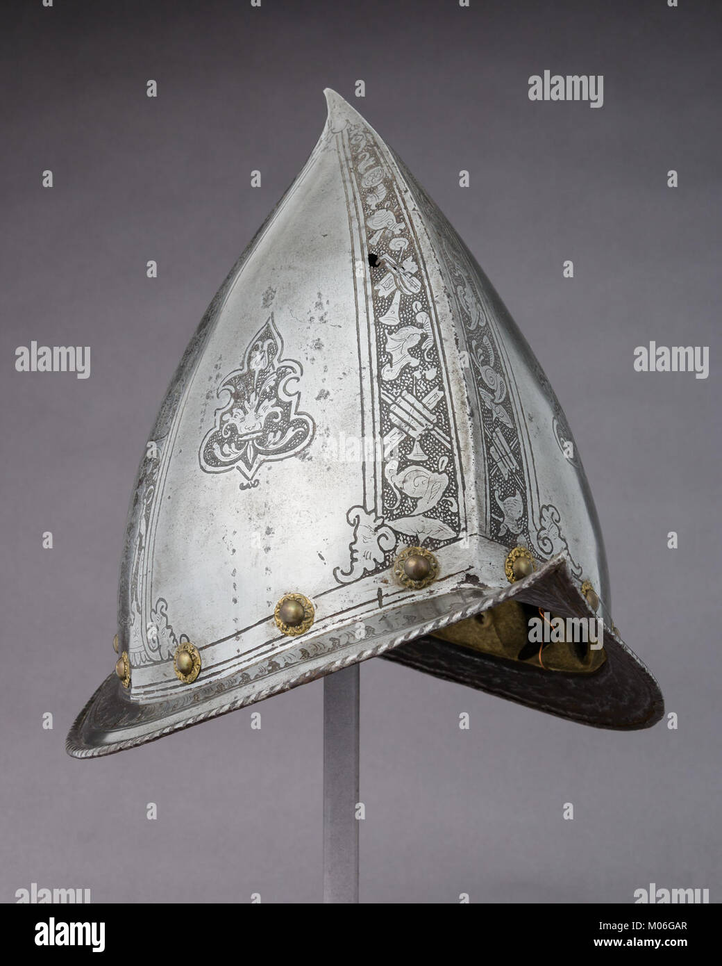 This Morion-Cabasset helmet represents historical armor used in warfare ...