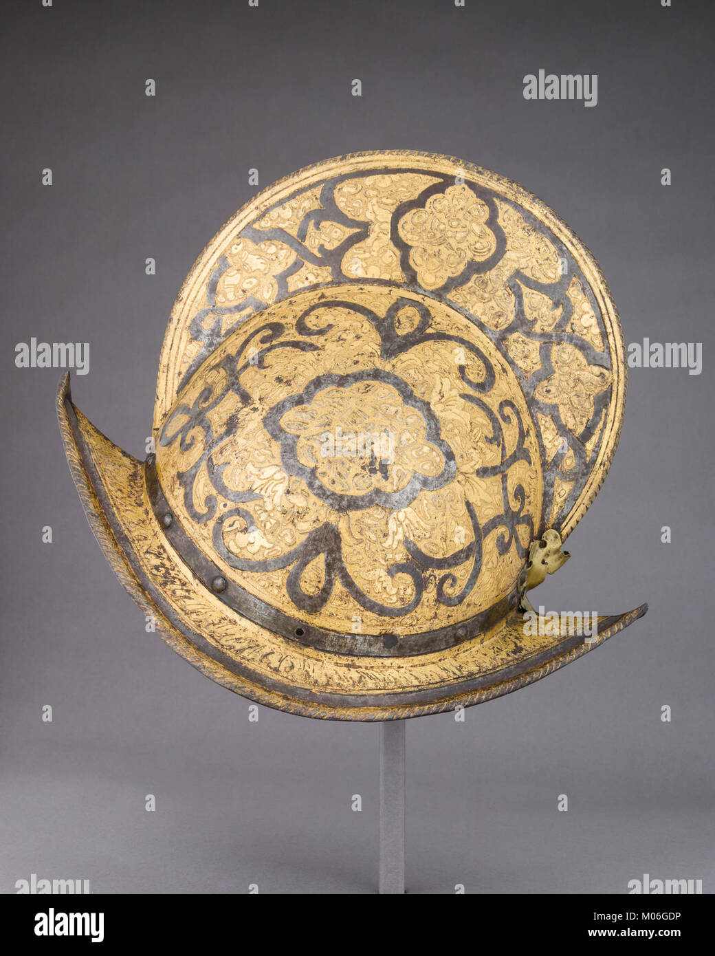 This morion, a type of helmet from the 16th century, represents the ...