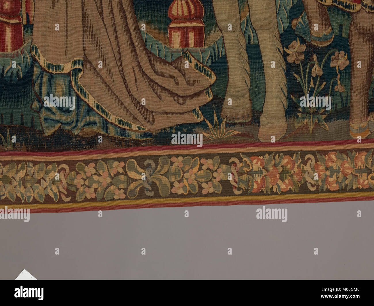 This tapestry depicts a hunting scene for wild boar, showcasing a ...