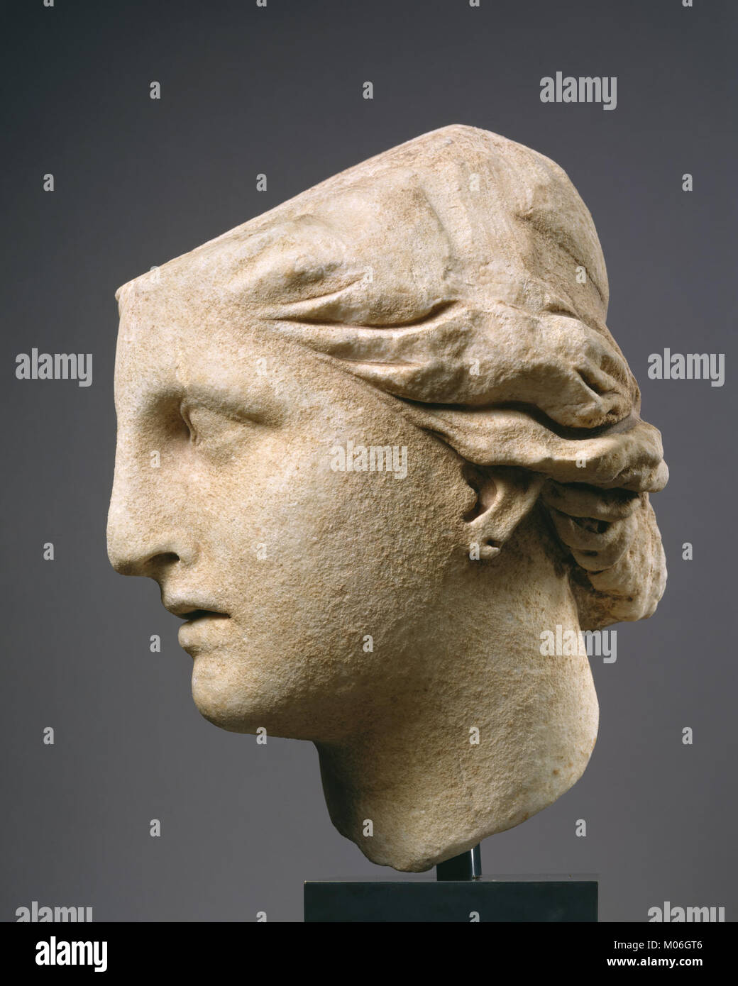 This marble head of Athena, a goddess in Greek mythology, exemplifies ...