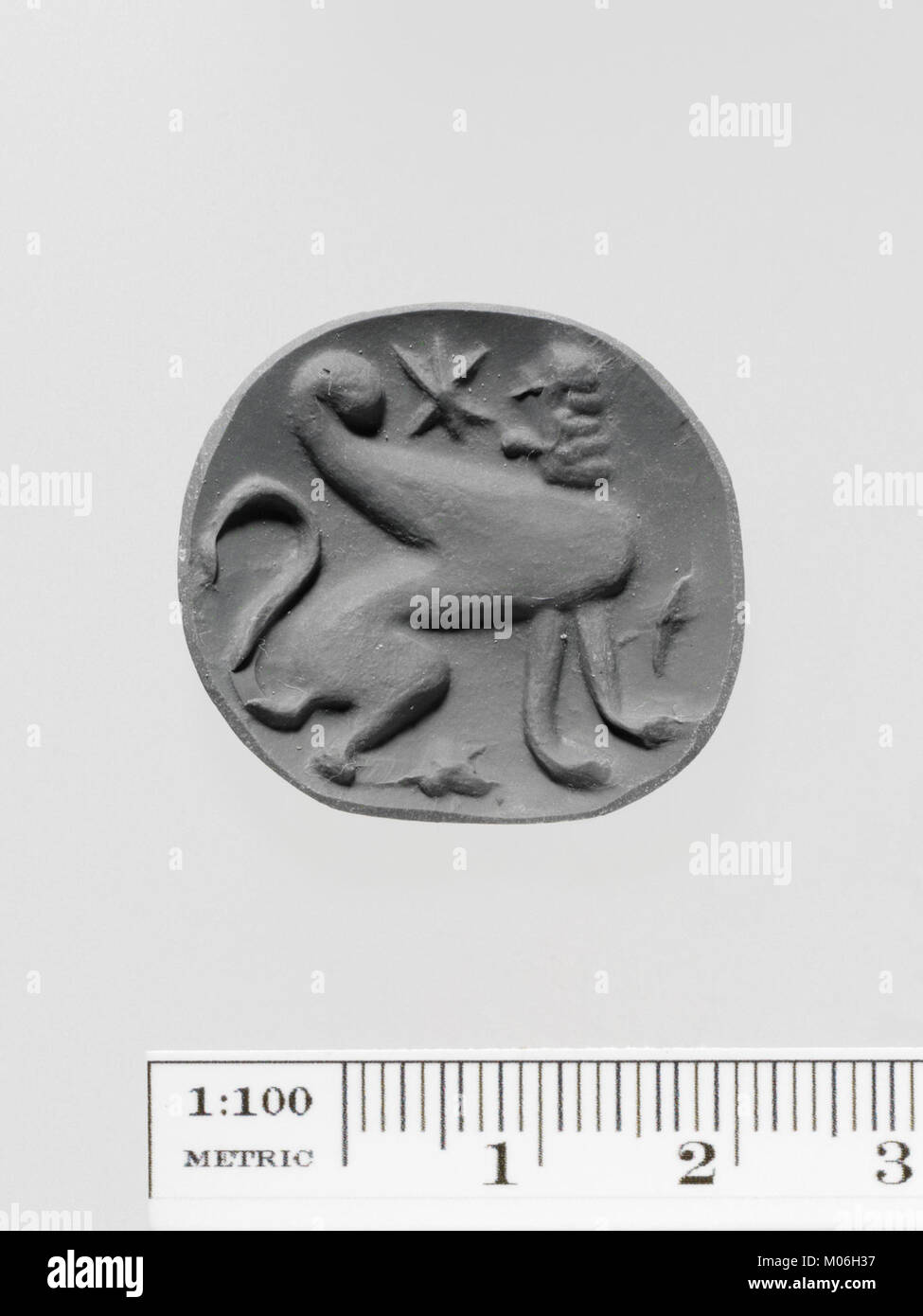 This lentoid seal, made from micaceous stone, was likely used for ...