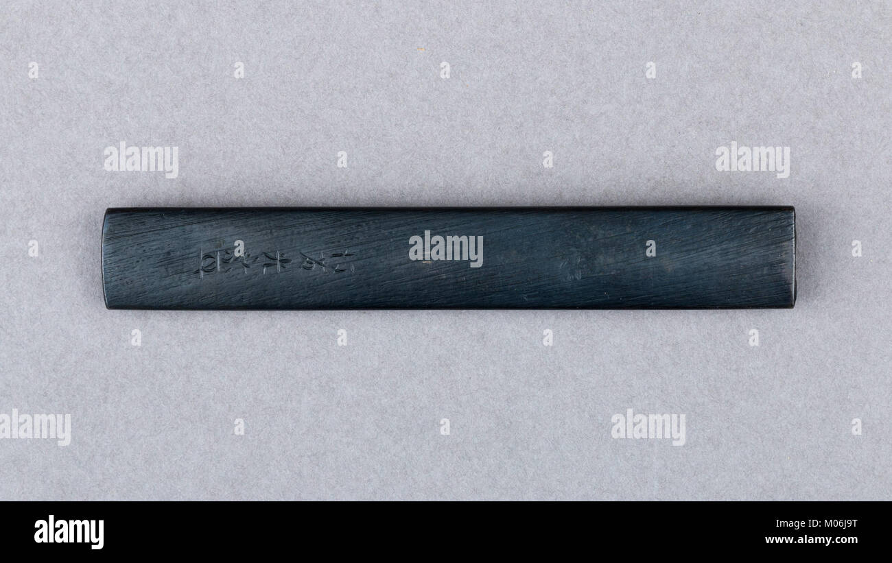 This kozuka, a knife handle, showcases detailed craftsmanship ...