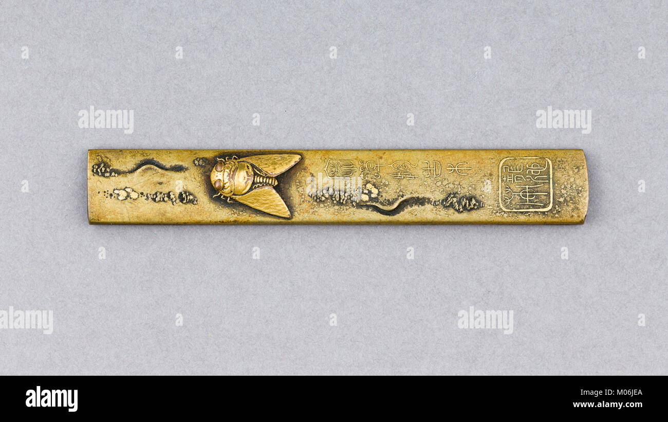 A knife handle (Kozuka) from the MET collection, identified by the ...