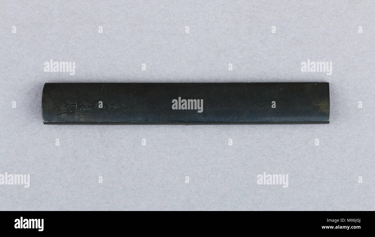 This kozuka knife handle is a preserved Japanese artifact, highlighting ...