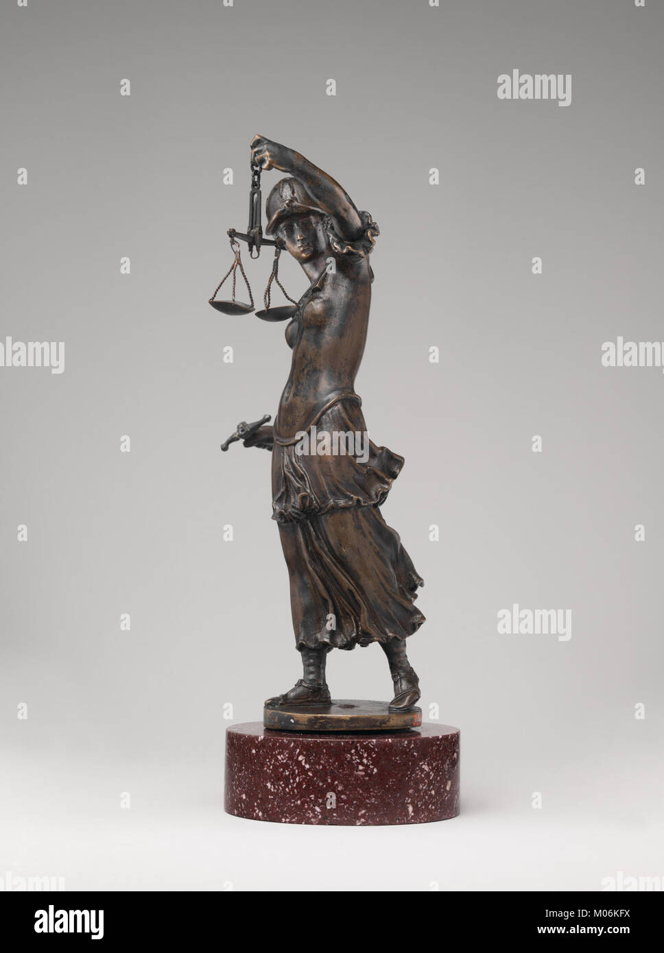 This representation of Justice is captured in a classic form ...