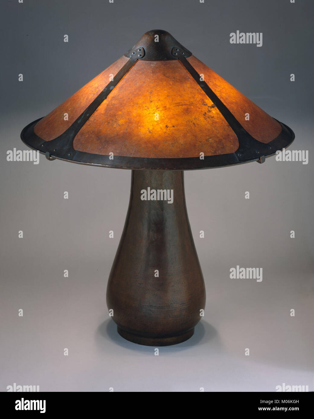 This lamp is an example of ancient lighting technology, made from metal ...