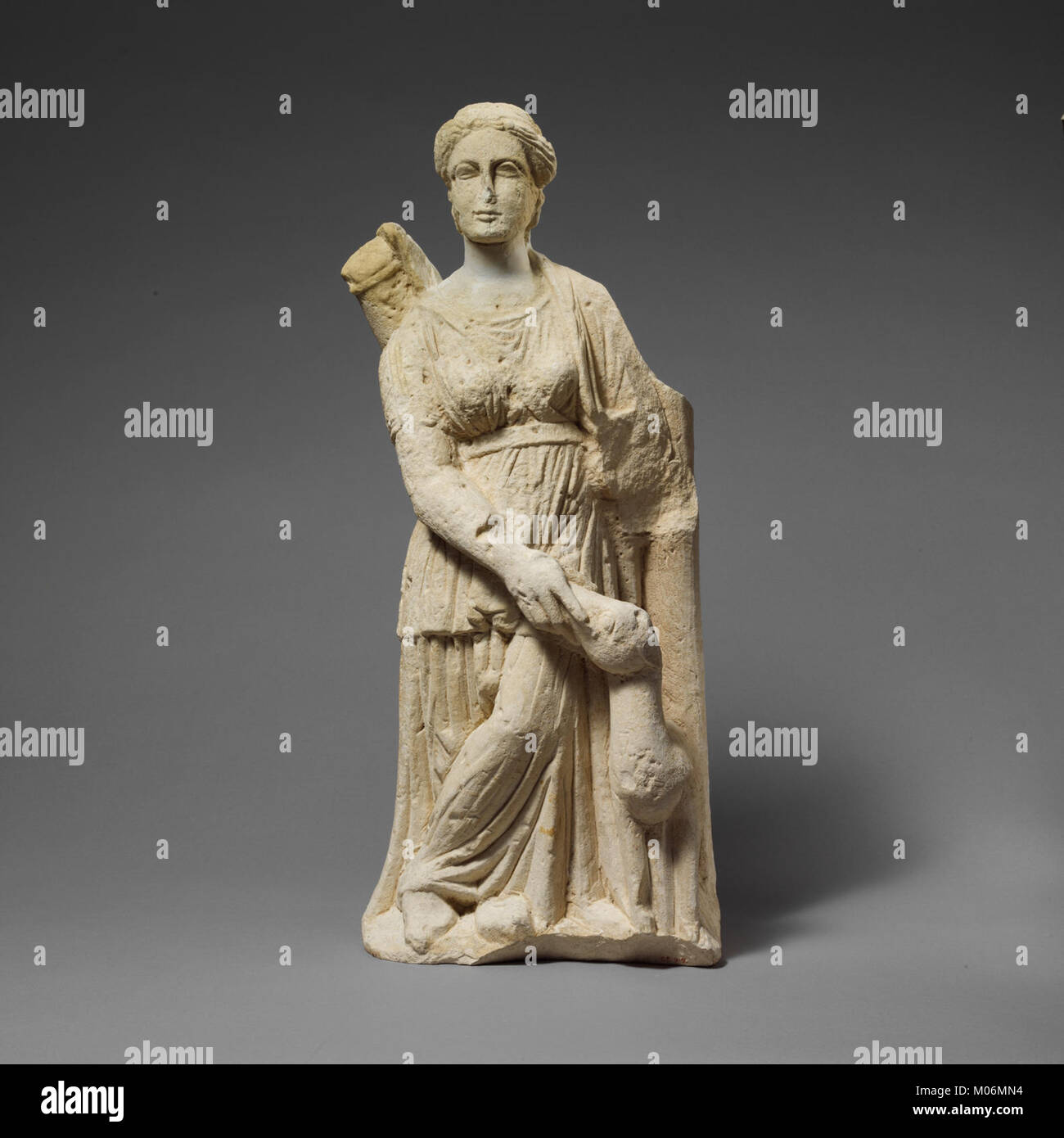 This limestone statuette depicts Artemis, the Greek goddess of hunting ...