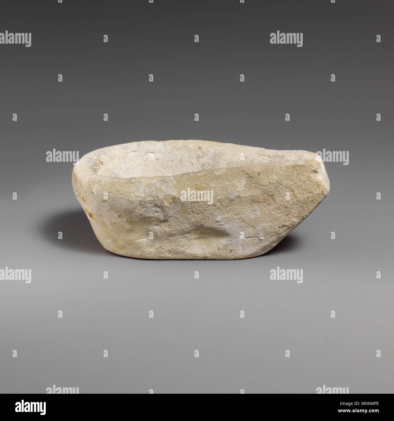 A limestone saucer lamp from the MET collection, used for illumination ...