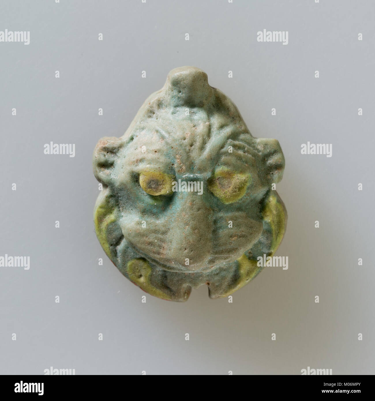 This lion head amulet, cataloged as MET LC-10 130, is a protective ...