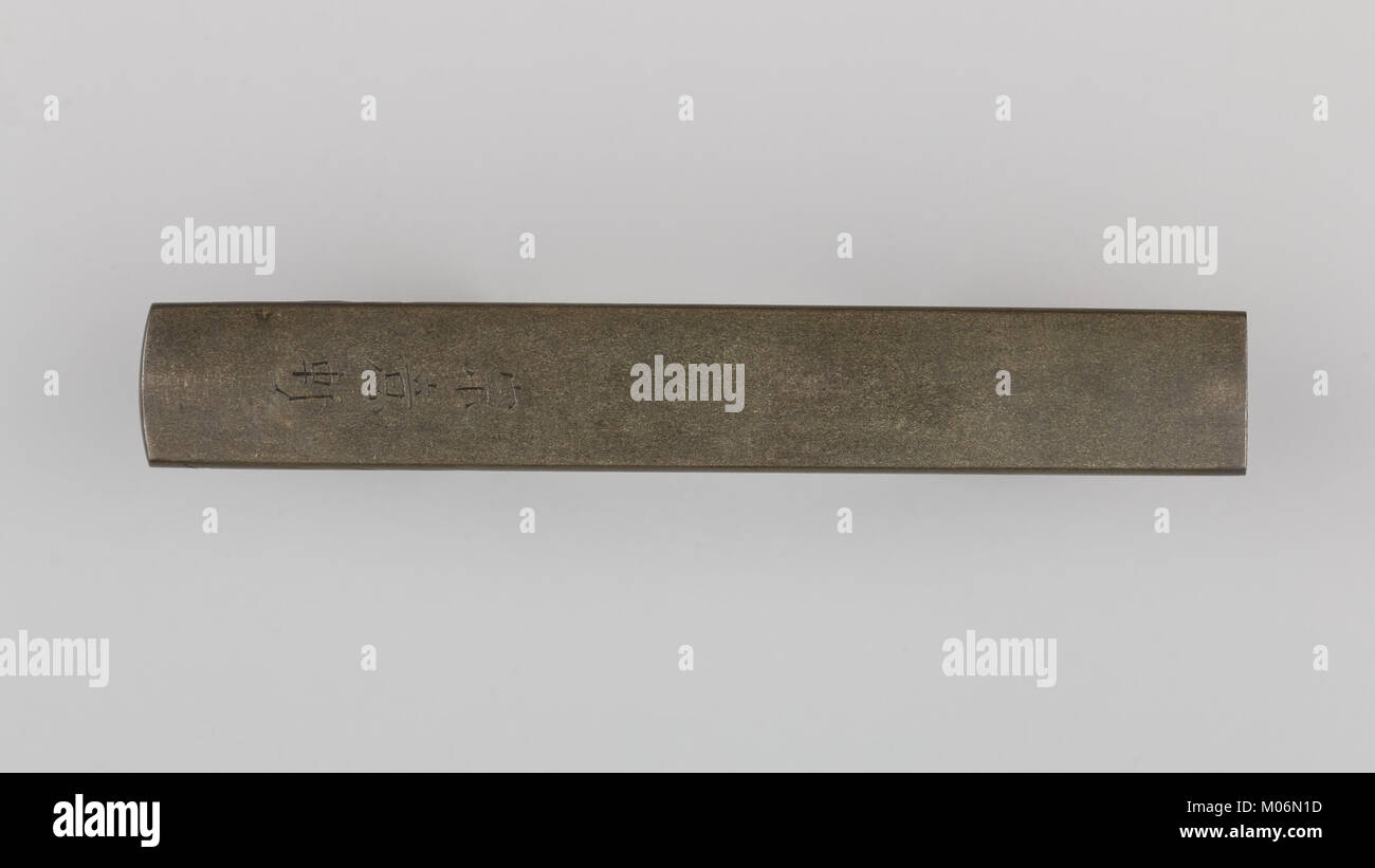 This Kozuka, a knife handle from Japan, features detailed carvings and ...