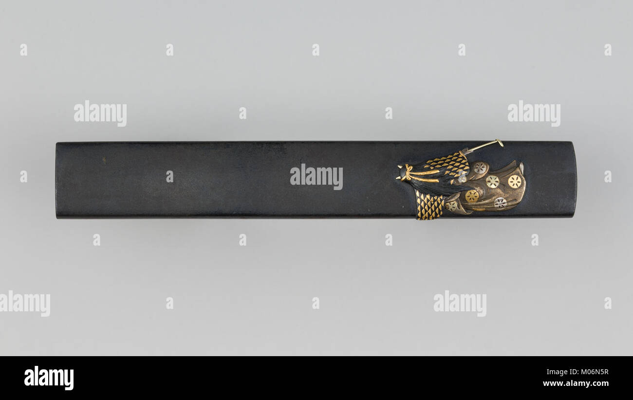 This kozuka knife handle, a key feature of Japanese swords, showcases ...