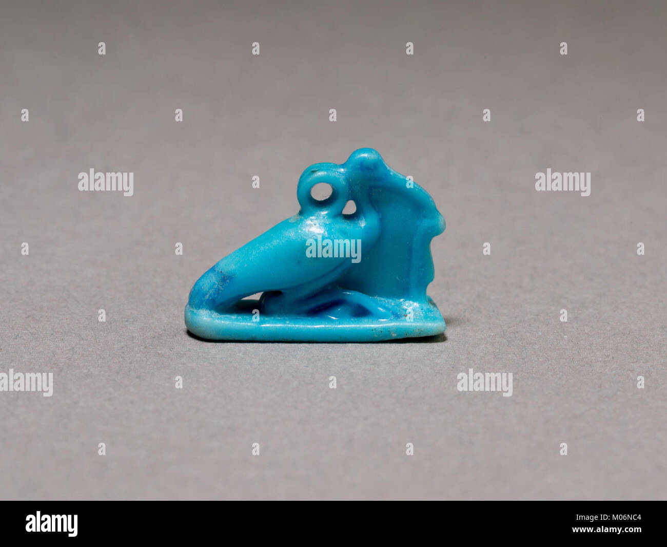 This object depicts an ibis with a maat feather, symbolizing truth and ...