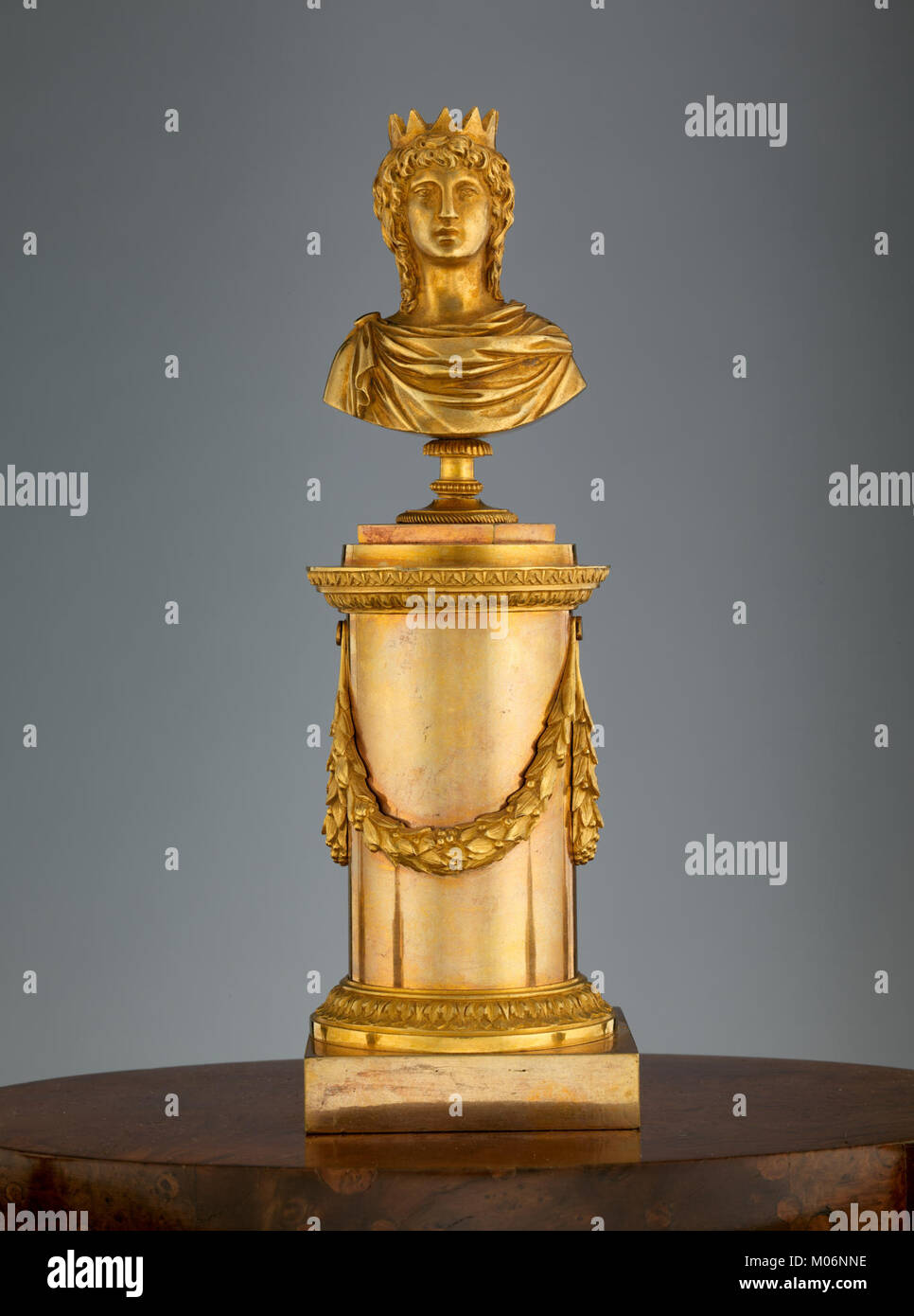 An obelisk-shaped clock featuring a Franklin movement, showcasing the ...
