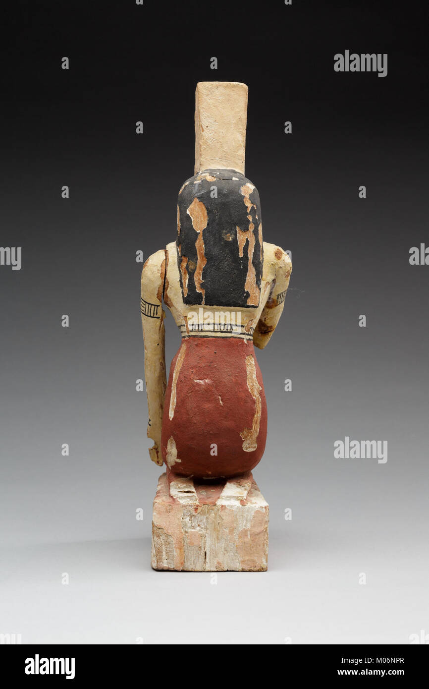 This sculpture of Mourning Isis depicts the goddess in a somber pose ...