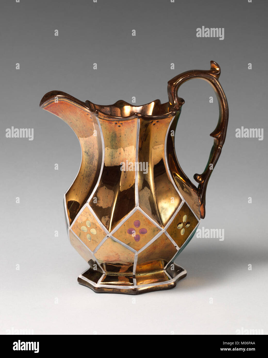 A historical jug showcasing craftsmanship and design from its period ...