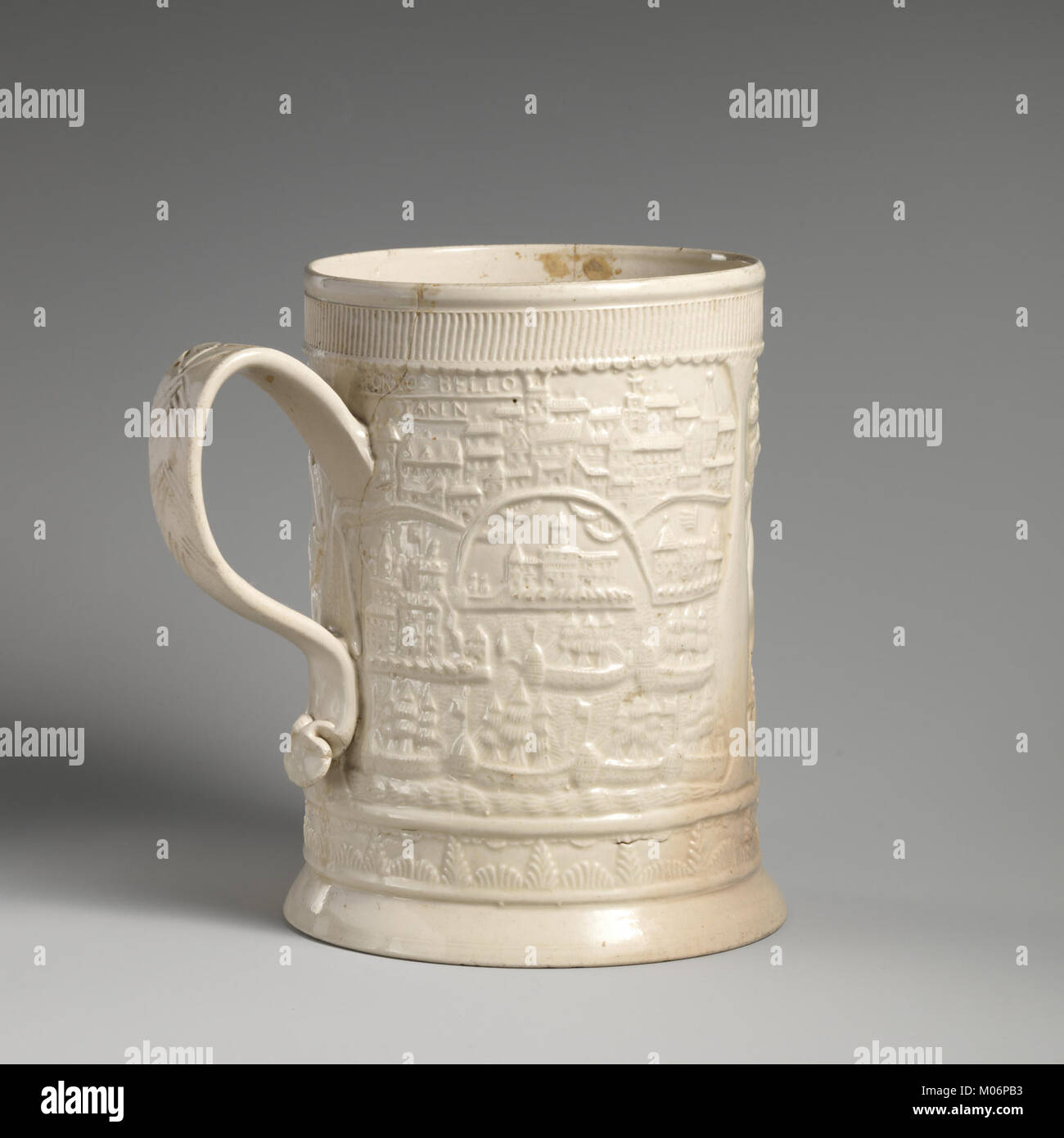 This mug features decorative design elements, crafted from ceramic ...