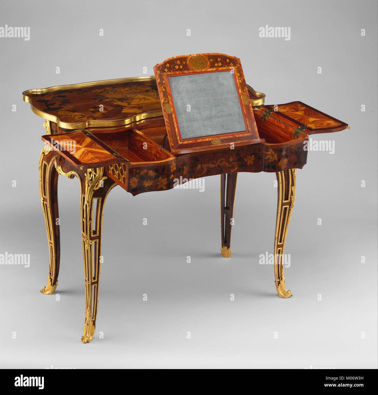 This mechanical table demonstrates intricate design and engineering ...