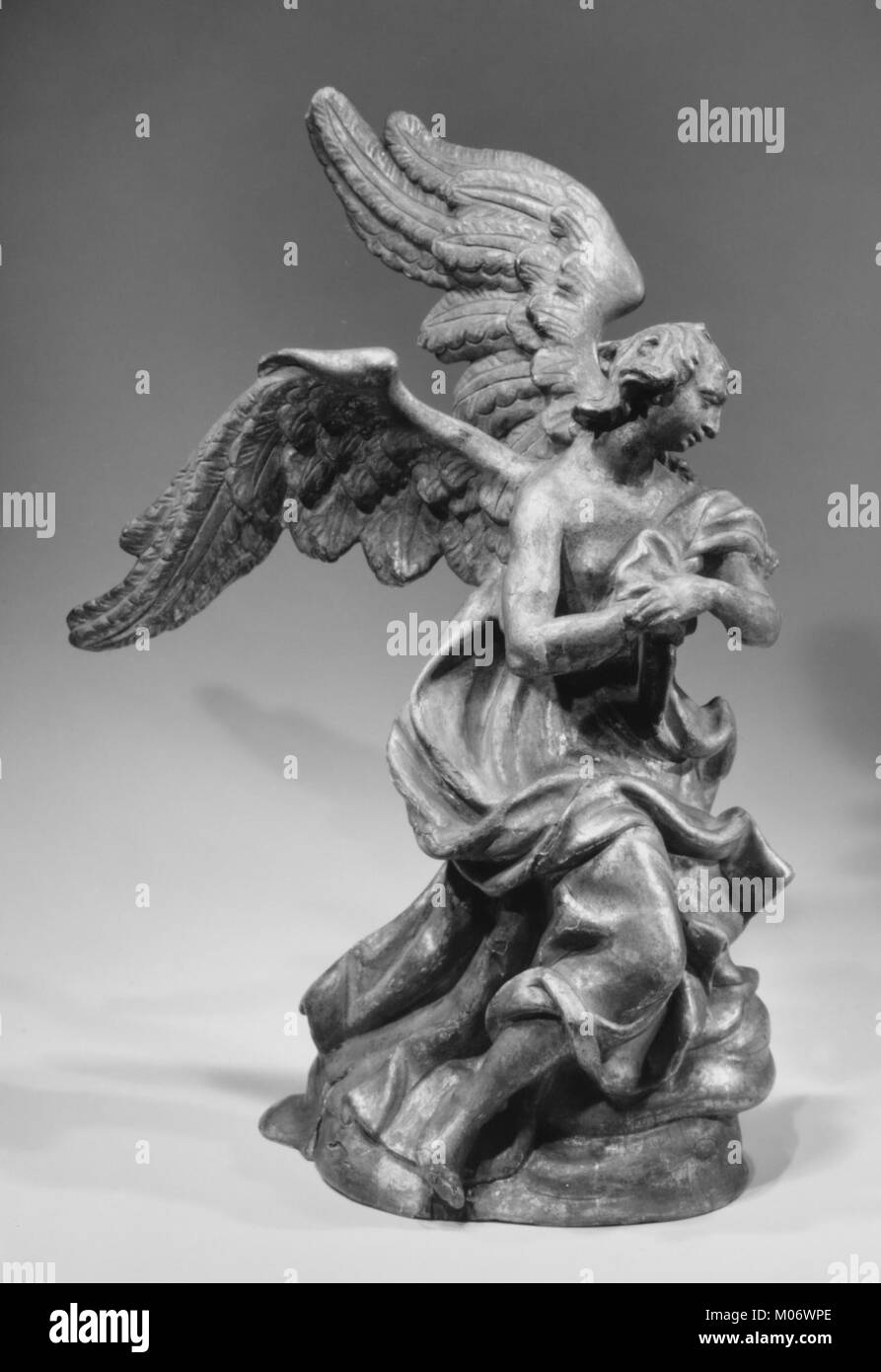 Angel kneeling Black and White Stock Photos & Images - Alamy