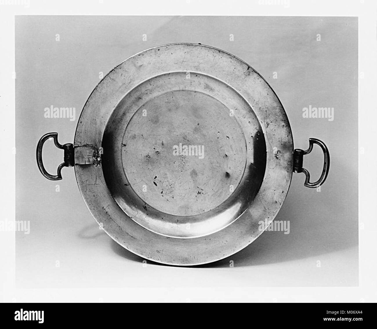 This hot water plate is designed to retain and distribute heat. It was ...