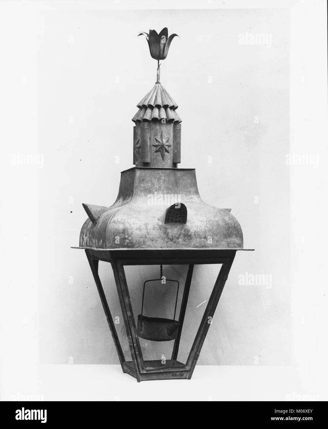 This lantern is a functional yet decorative object, reflecting the ...