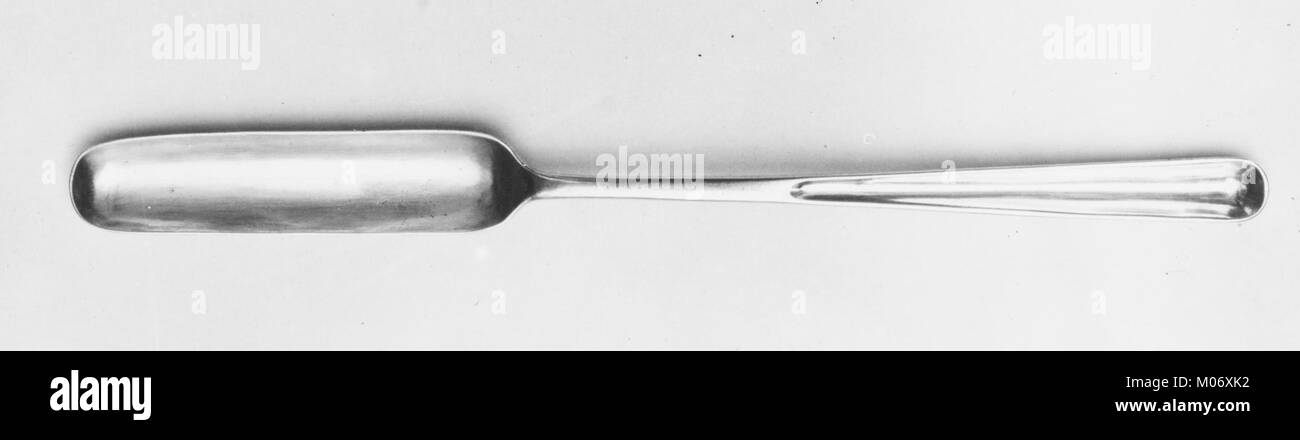 A marrow spoon, crafted in metal, used historically to extract marrow ...