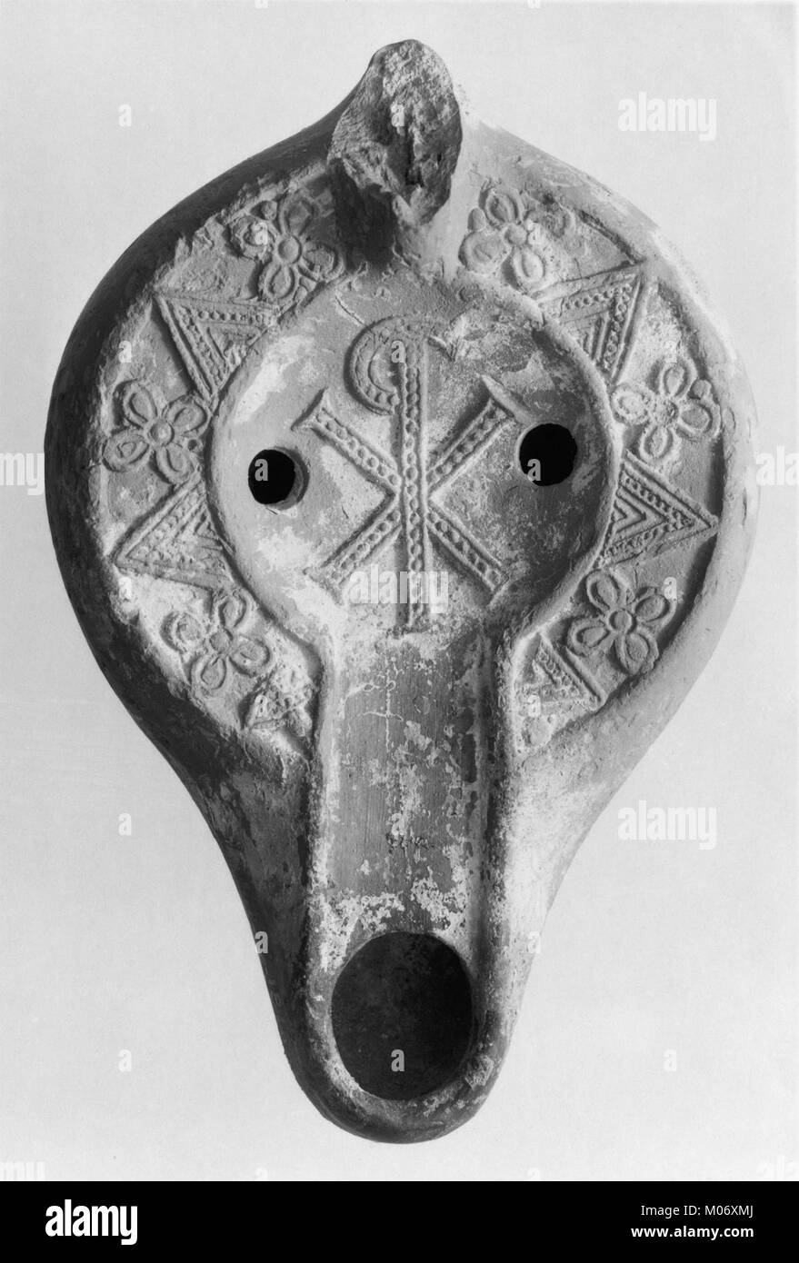 Ancient lamp demonstrating lighting technology with functional ...