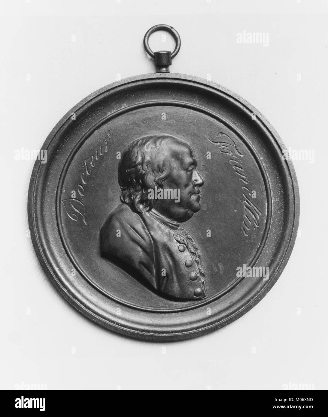 This medallion, a fine example of historical craftsmanship, features ...