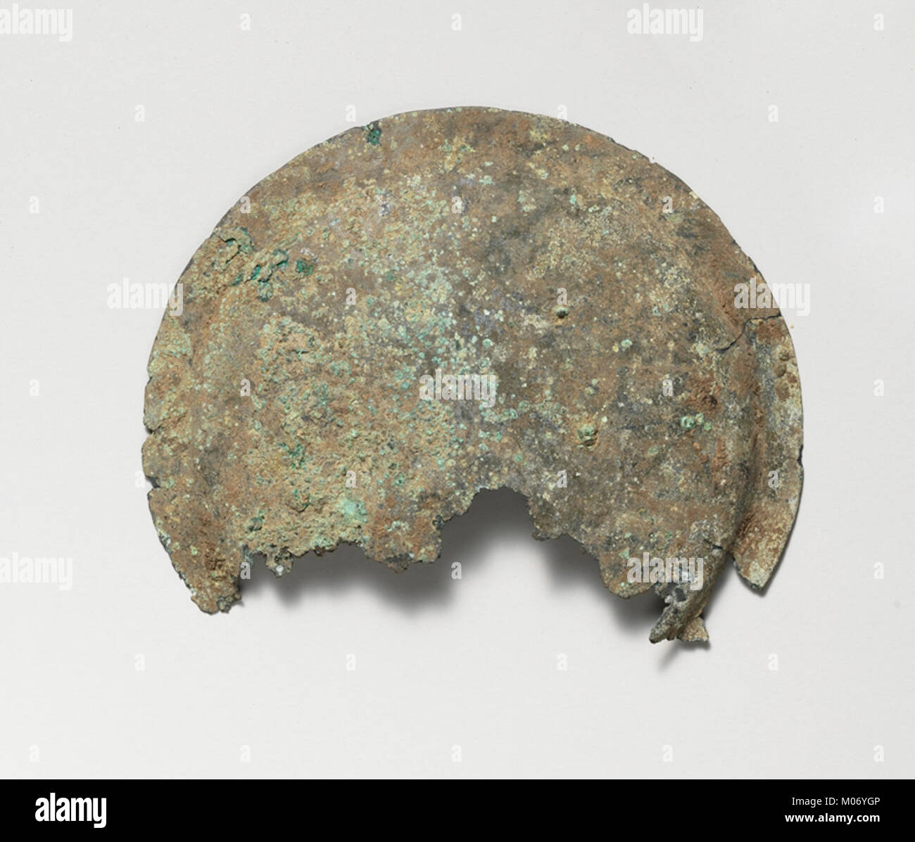 This miniature bronze shield is a finely crafted representation of ...