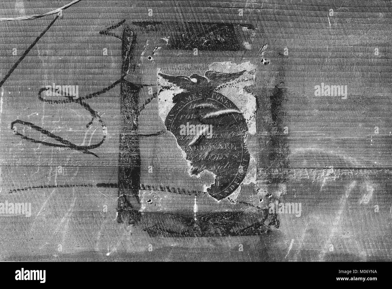 This looking glass, or mirror, is a finely crafted example of ...