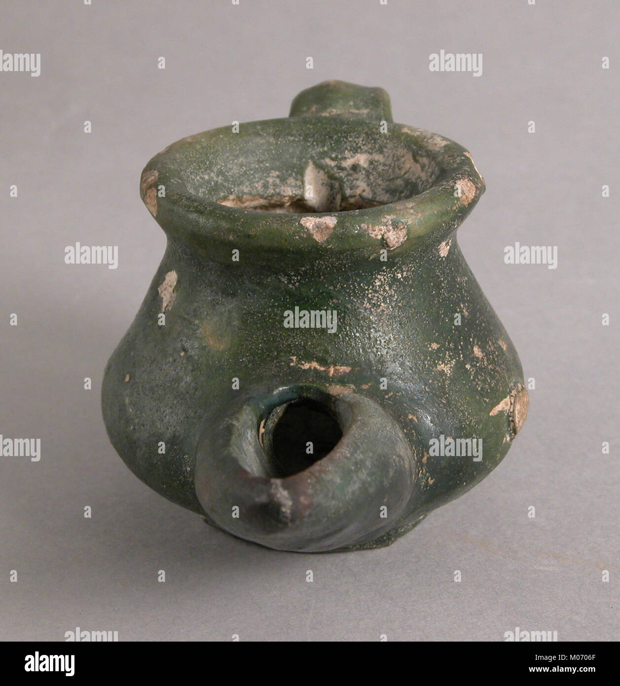 A lamp with a distinctive design, featuring intricate details that ...