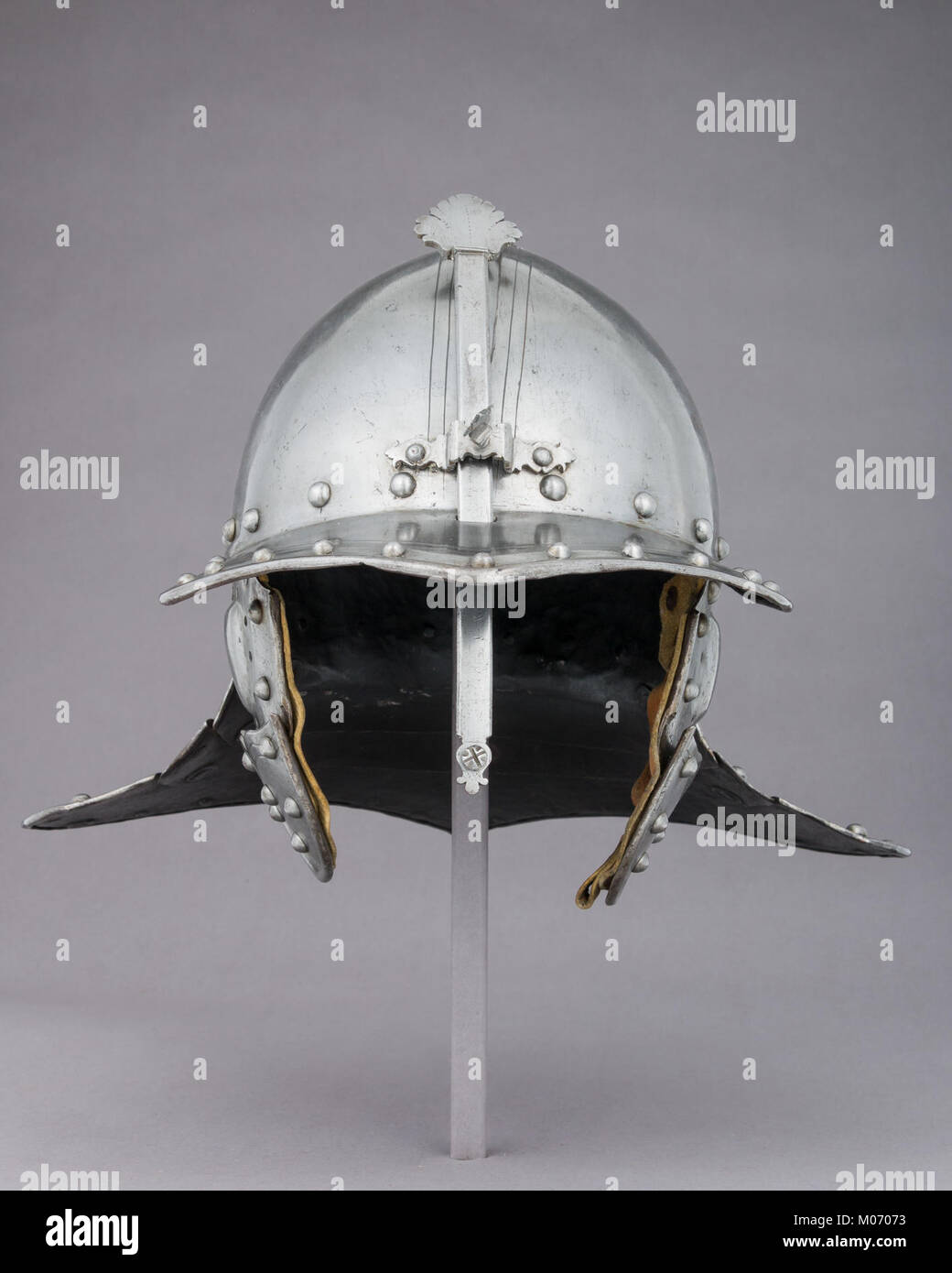 This 16th-century Lobster-Tail Burgonet is a steel helmet featuring a ...