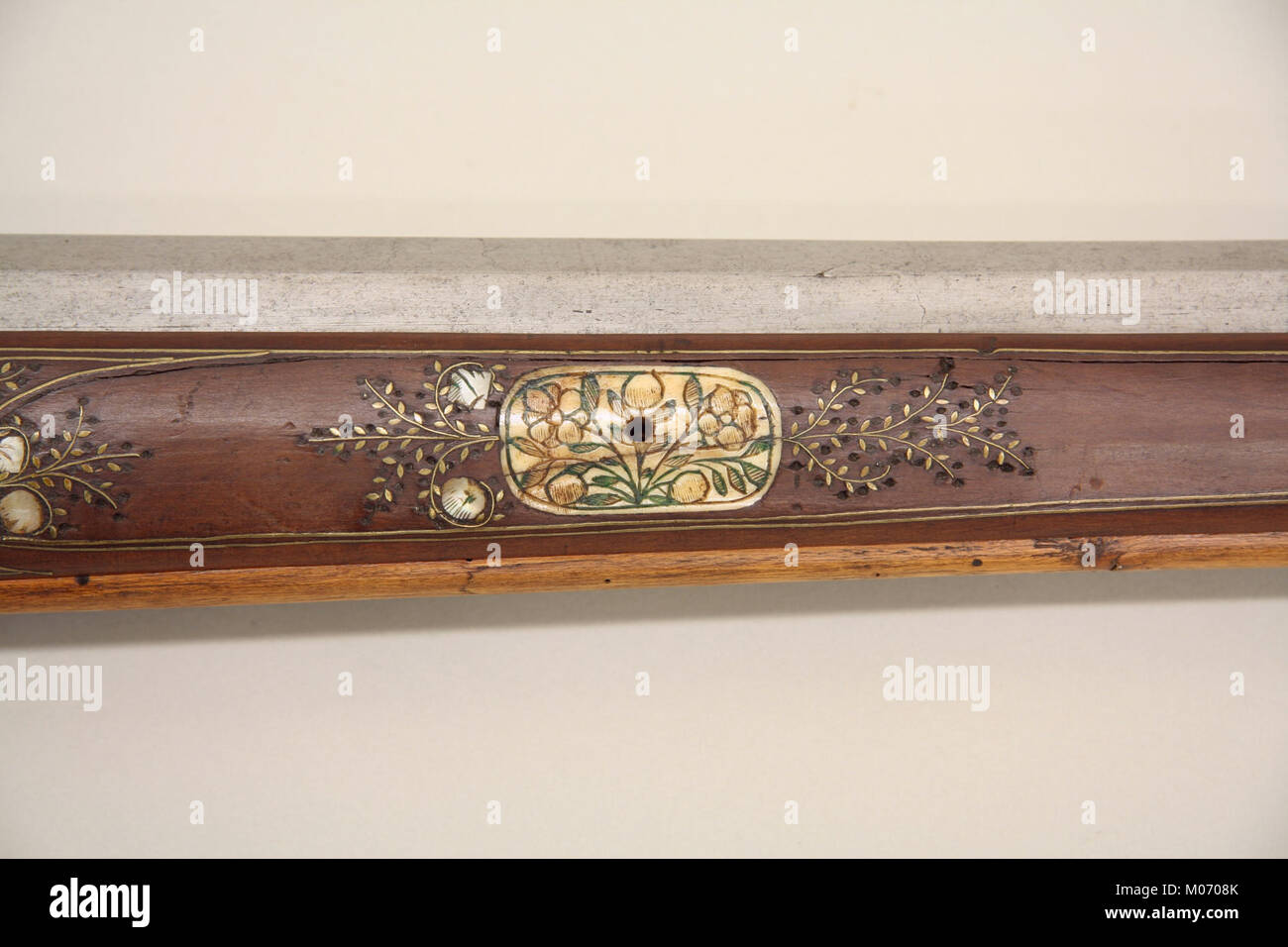 This matchlock gun represents early firearm technology, showing design ...