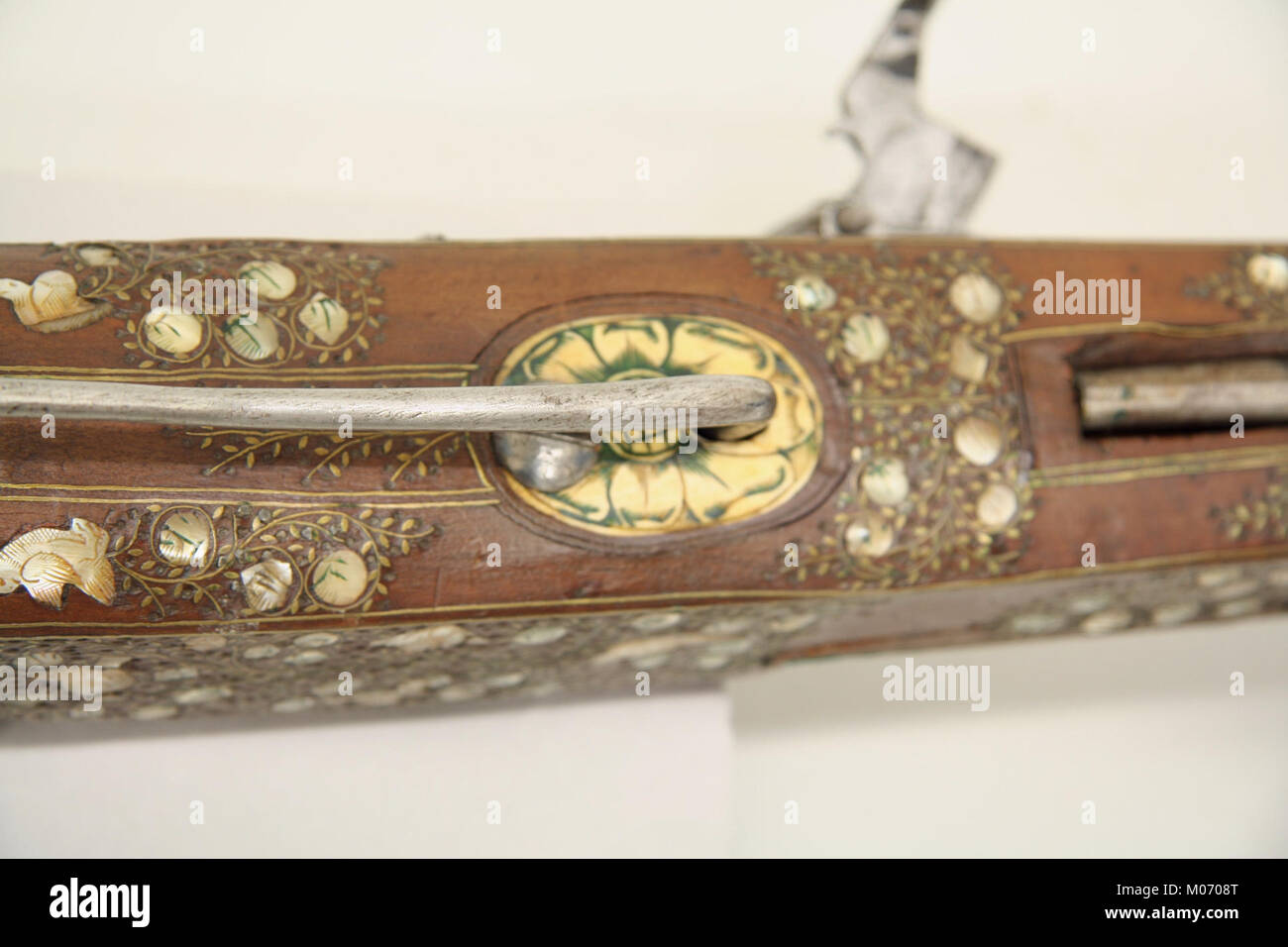 This matchlock gun represents early firearm technology, featuring the ...