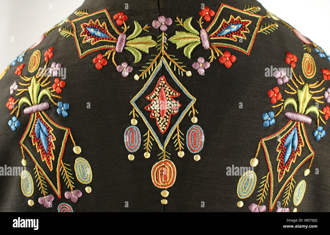 This mantle is a historical garment made from high-quality fabric ...