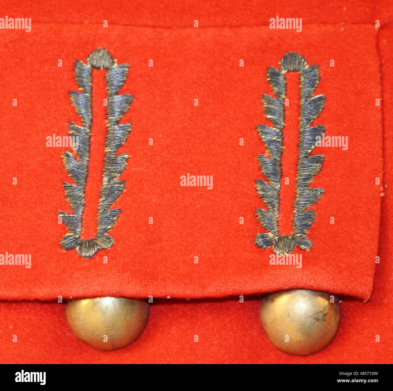 A military coat, reflecting the uniform style and function of military ...