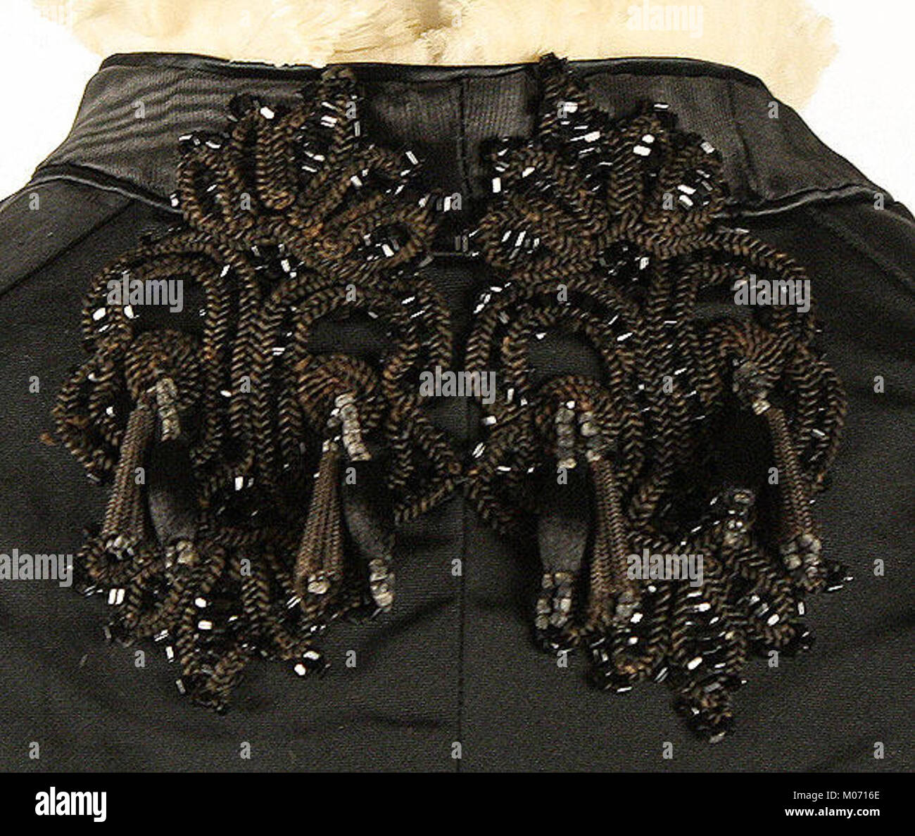 This mourning dress from the 19th century represents a somber, formal ...