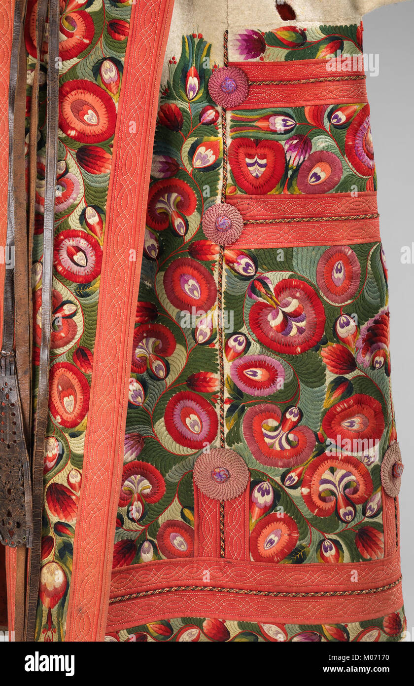 This mantle, detailed in the collection, displays intricate design and ...