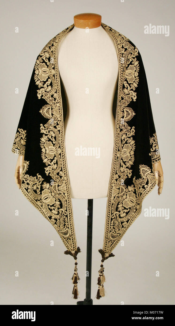 A decorative mantle, showcasing the textile techniques and fashion ...