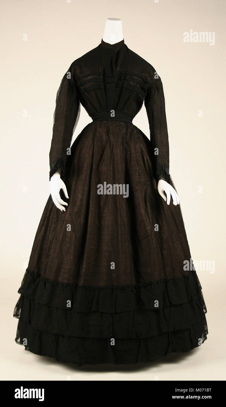This mourning dress reflects the somber and formal attire worn during ...