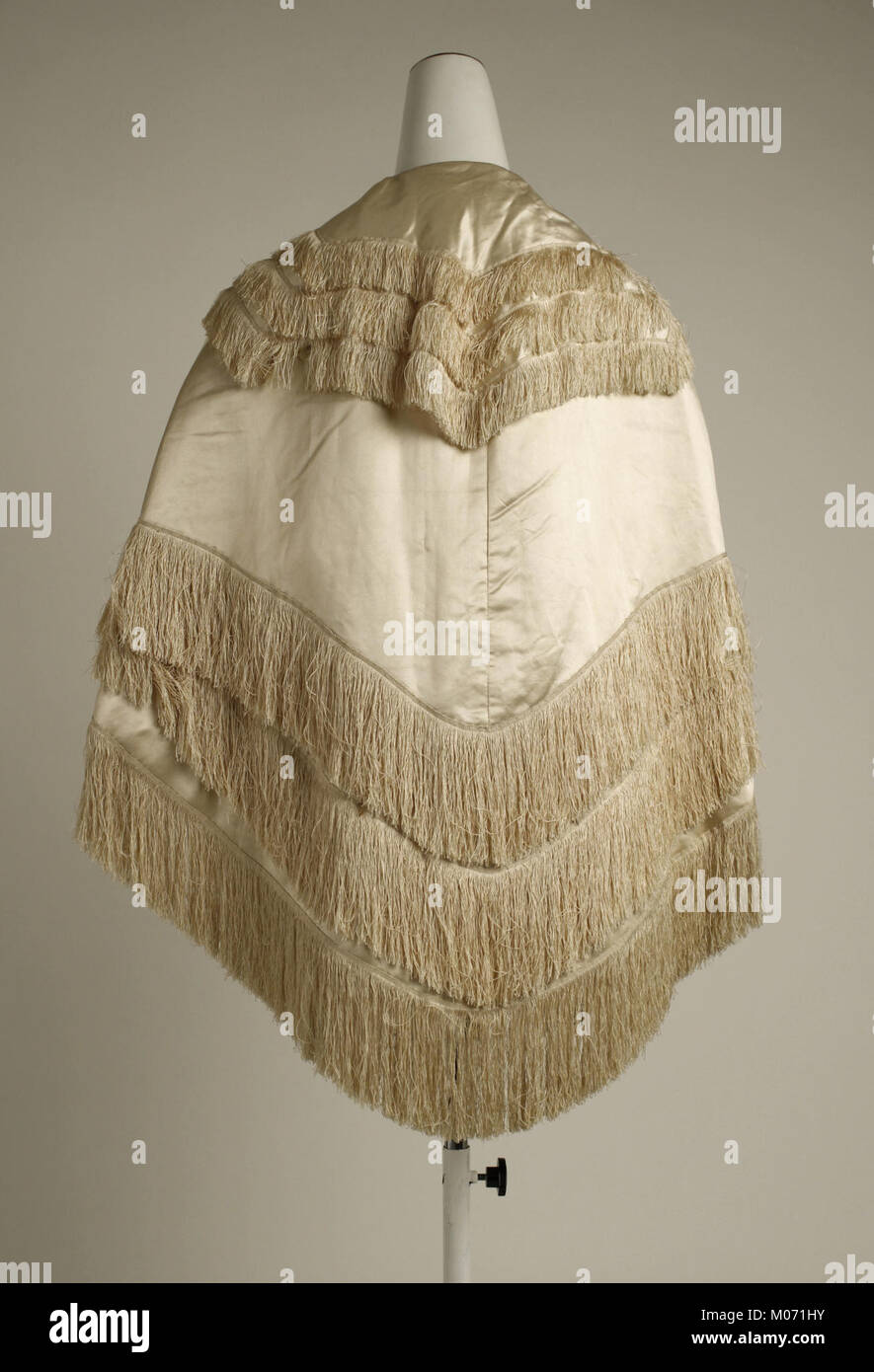 This mantle, part of the MET collection, is an elaborate outer garment ...