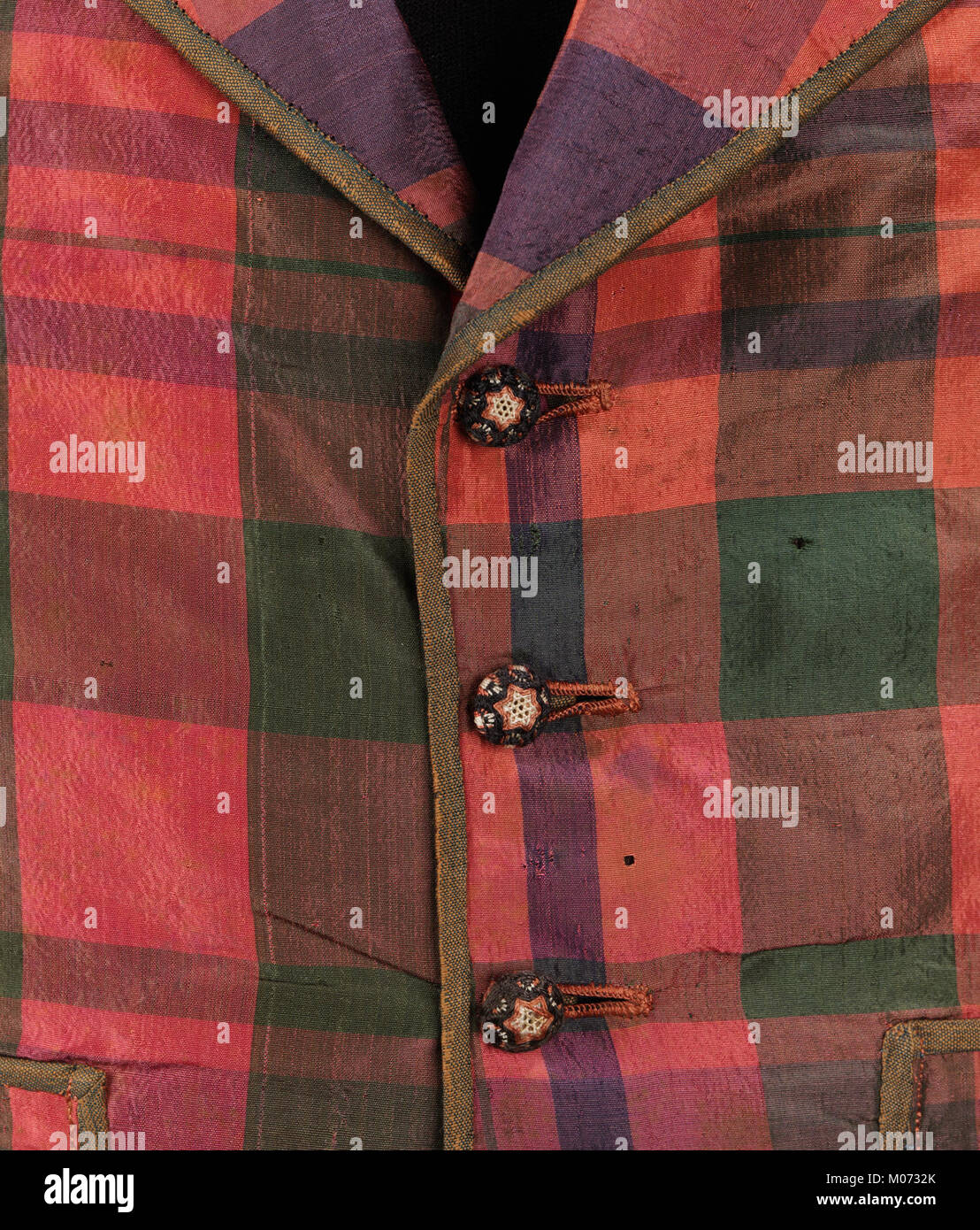 This detail of a morning vest highlights the fine craftsmanship and ...