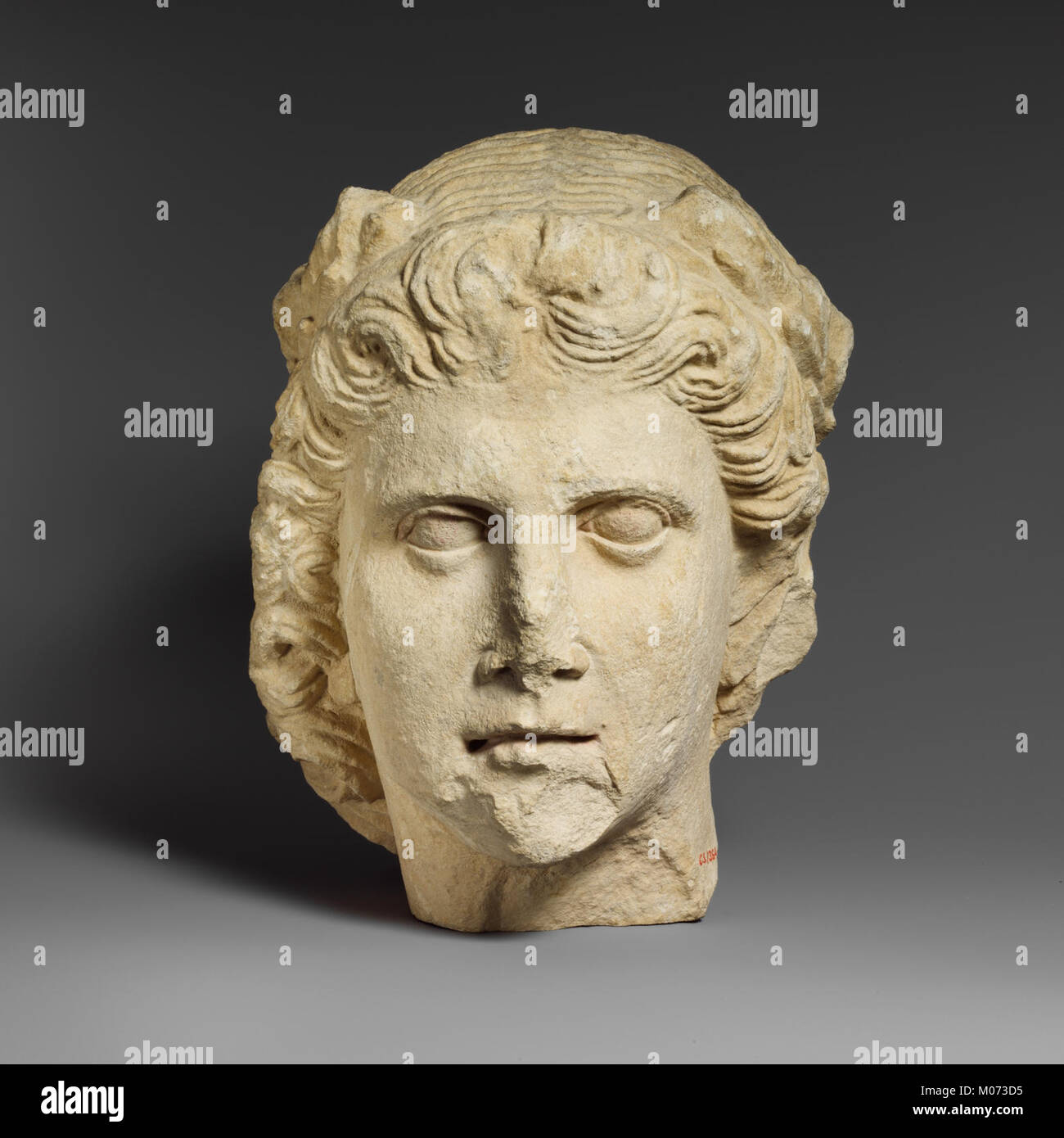 Limestone head of Apollo illustrating classical Greek sculpture ...