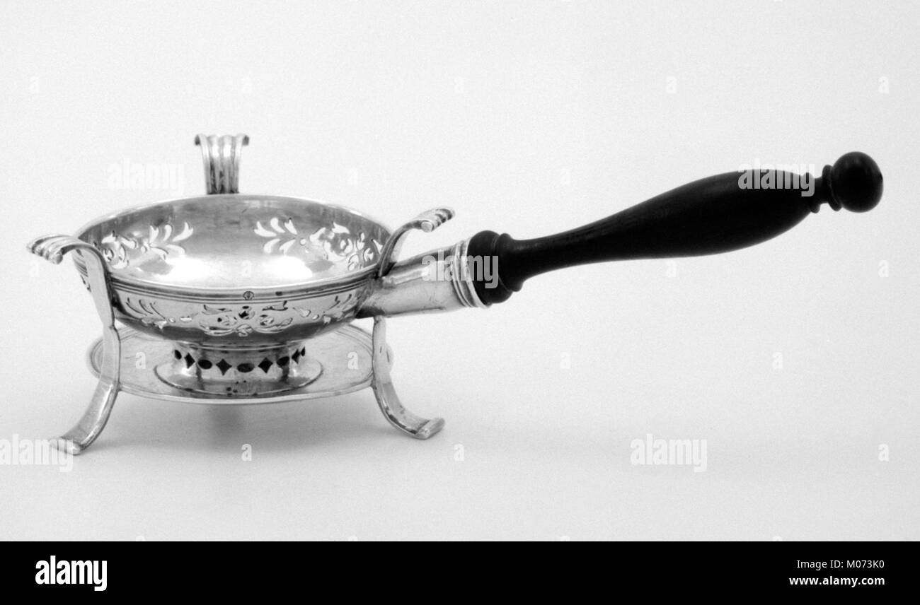 This miniature brazier, crafted with fine details, was likely used for ...