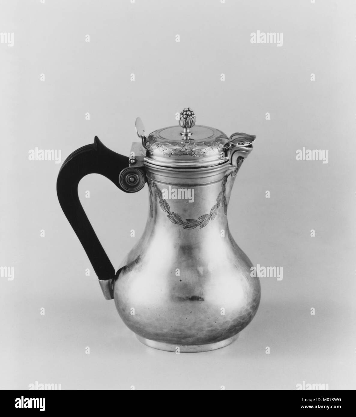 This milk pot, crafted from ceramic, was traditionally used for storing ...