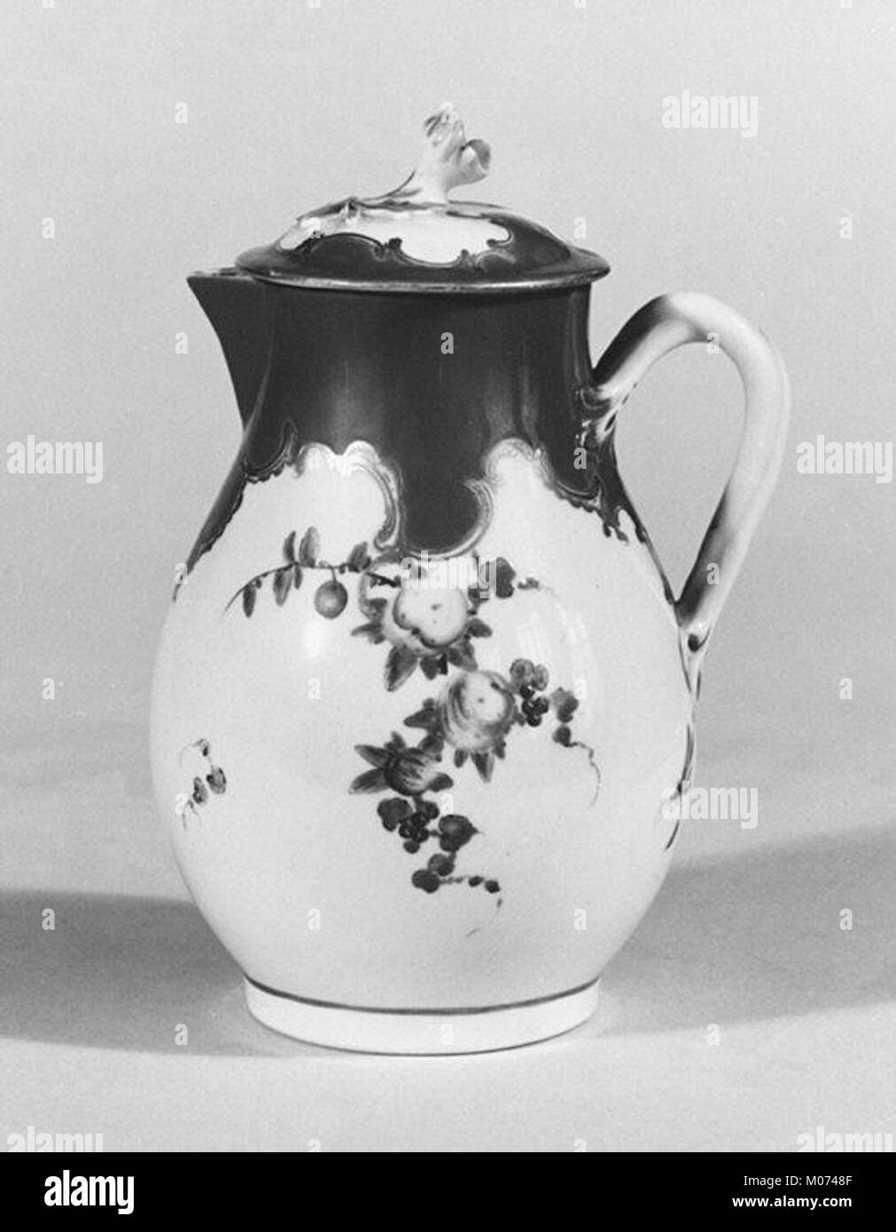 This milk jug with cover is a ceramic vessel from a service set ...