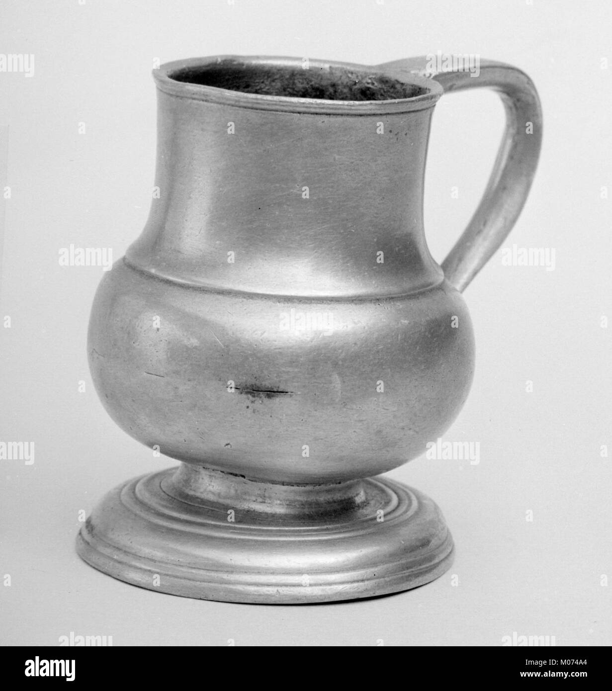 This jug is an example of historical ceramic design, with functional ...