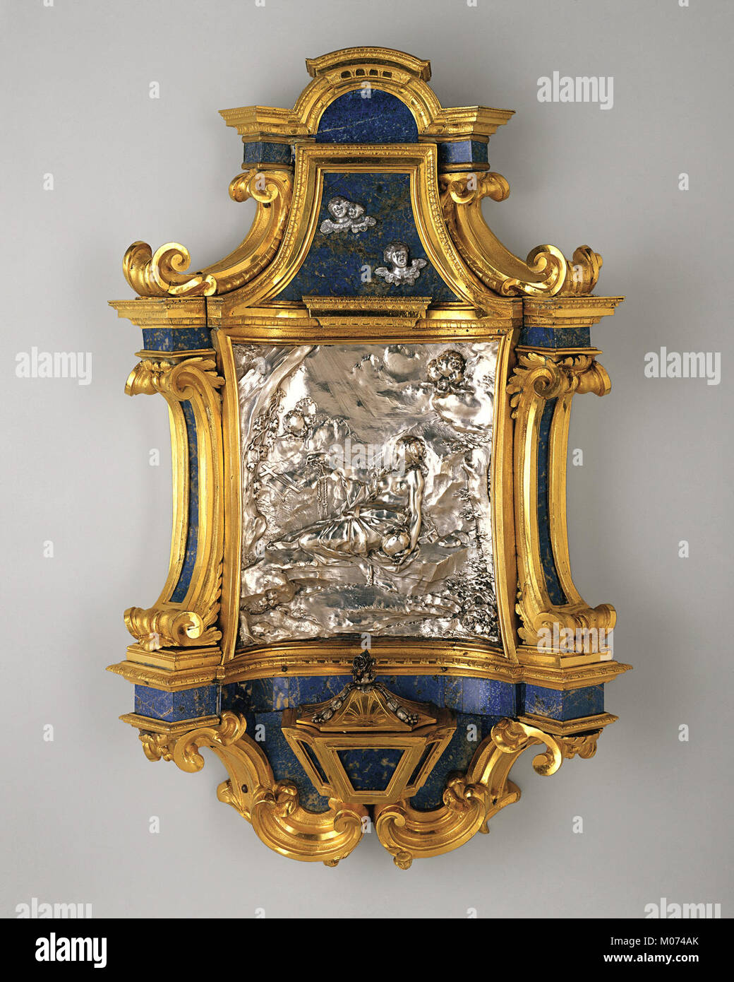 This holy-water stoup features a relief of Mary of Egypt, a revered ...
