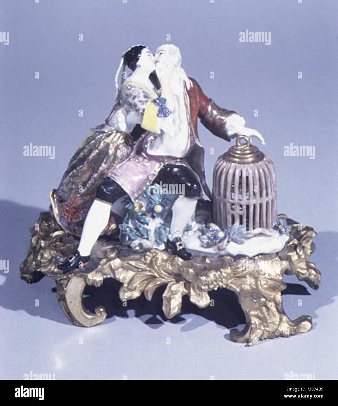 A depiction of lovers with a birdcage, capturing a symbolic moment of ...