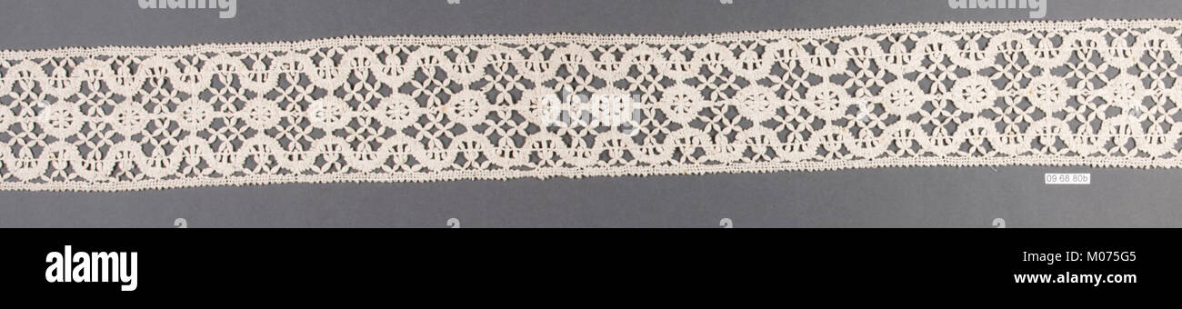 This lace insertion features intricate detailing, representing ...