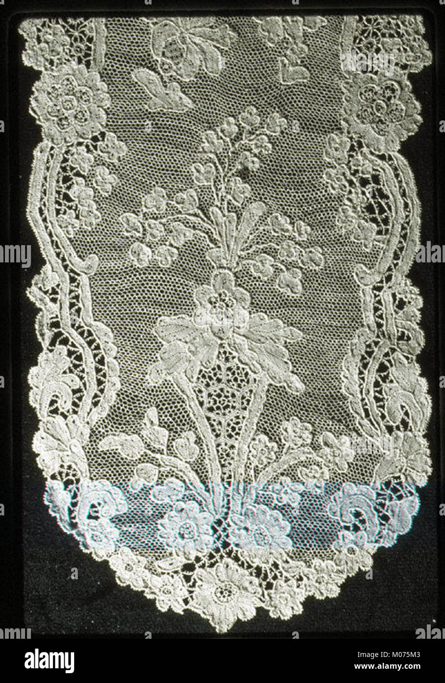 This piece features joined lappets, a type of decorative garment used ...